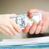 What Is the Difference Between Embezzlement and Money Laundering?